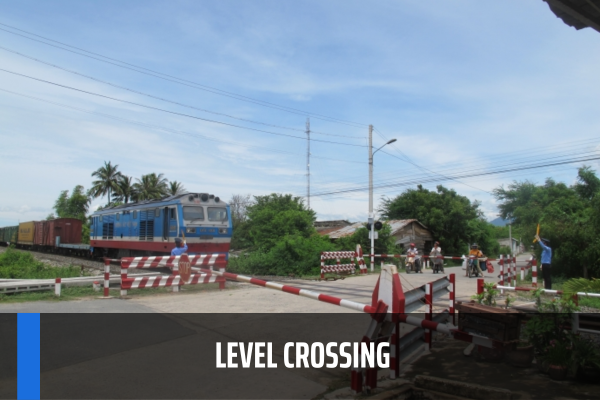 What are the regulations for road users when passing through a level ...